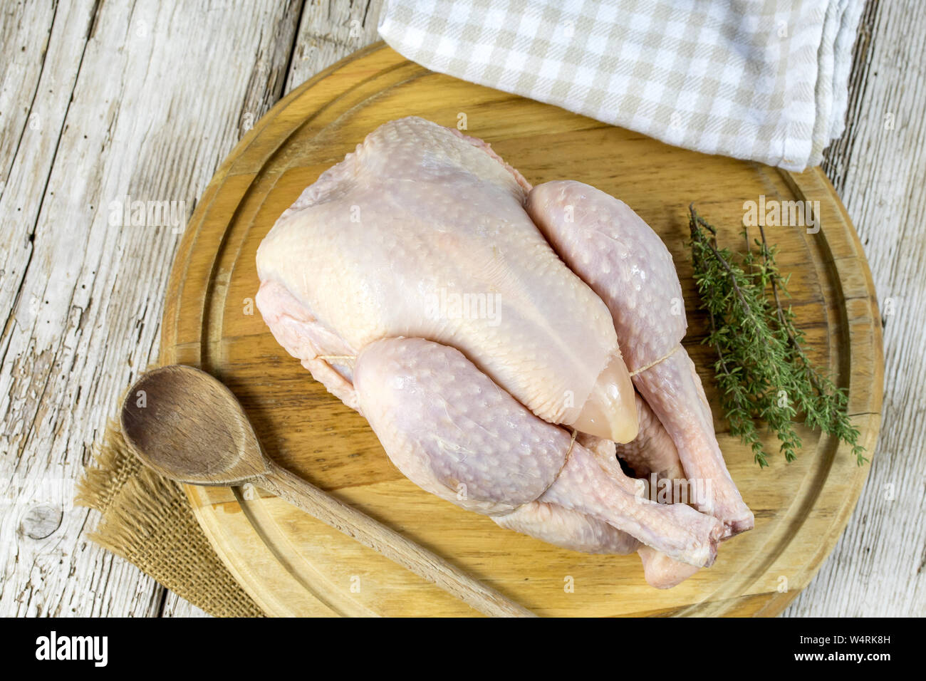 whole and raw chicken Stock Photo - Alamy
