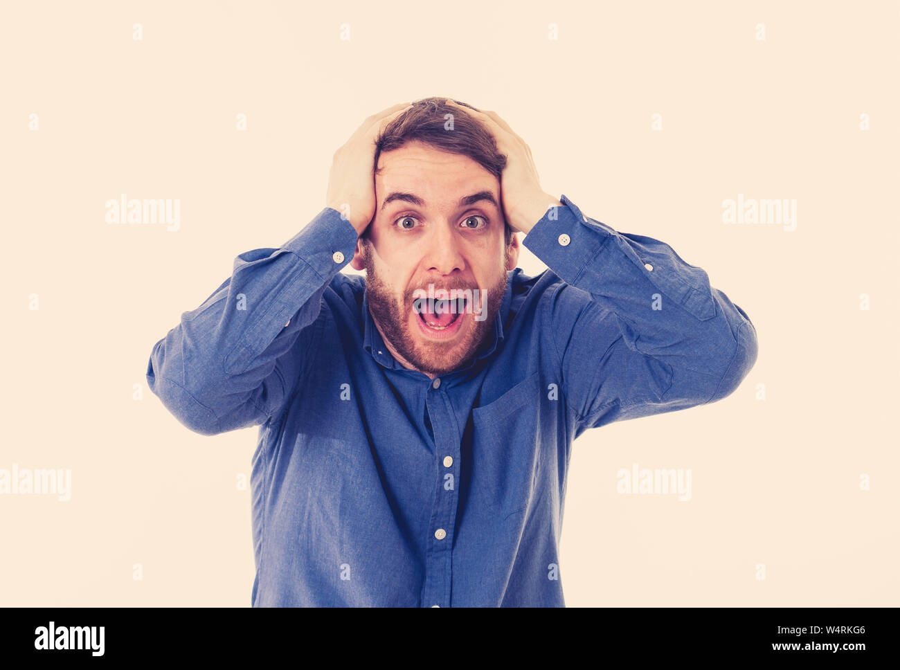 Portrait of funny attractive young man with happy and surprised face ... Portrait of funny attractive young man with happy and surprised face ...