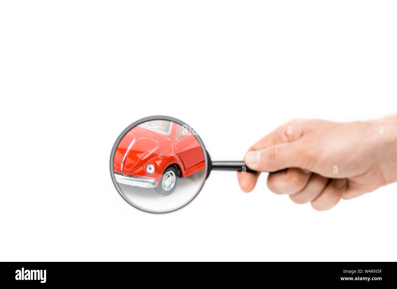 Car front in magnifier glass hi-res stock photography and images - Alamy