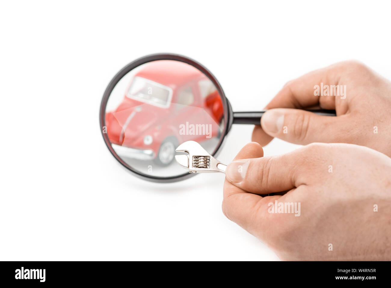 Car front in magnifier glass hi-res stock photography and images - Alamy