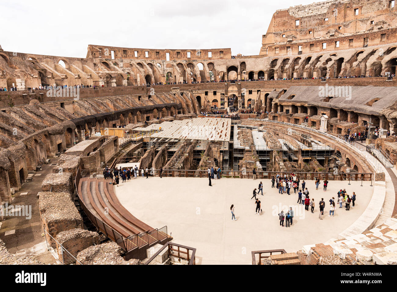 ROME, ITALY - JUNE 28, 2019: crowd of tourists in colosseum under grey ...