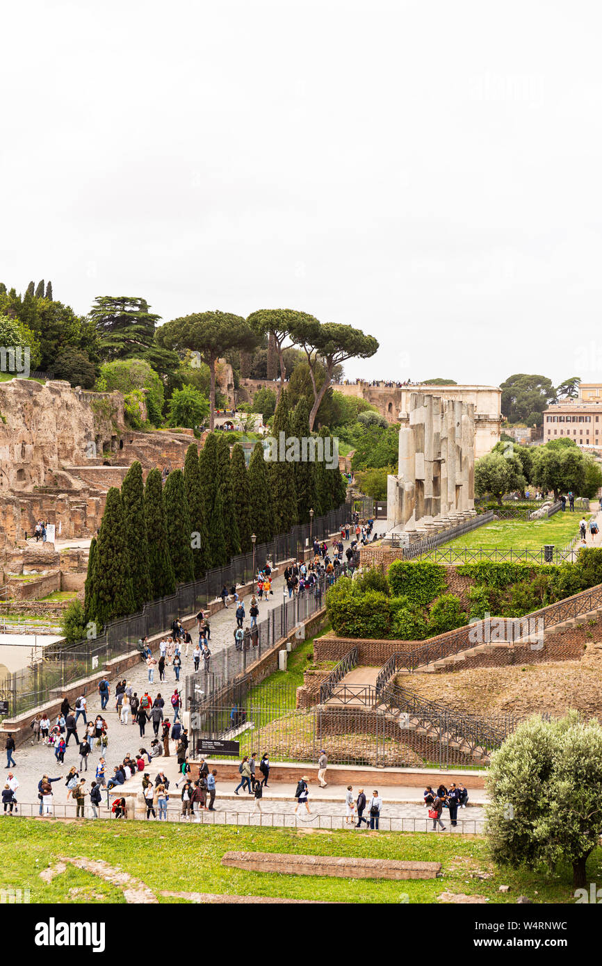 ROME, ITALY - JUNE 28, 2019: crowd of tourists walking at roman forum ...