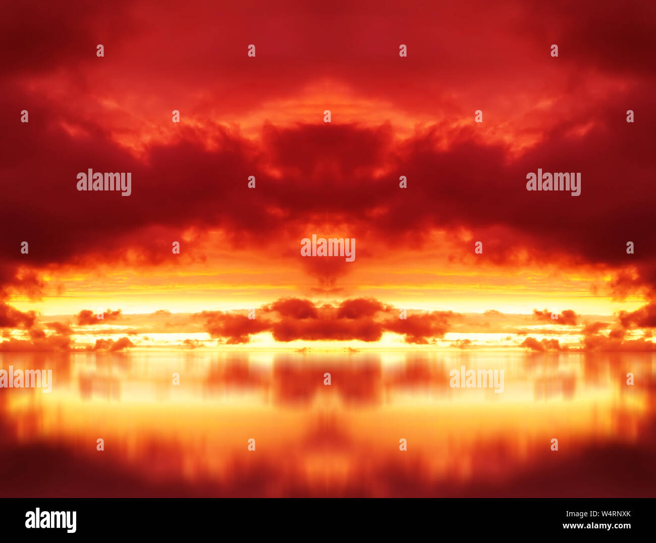 Red sunset over sea, rich dark clouds, Bright sun rays Stock Photo - Alamy