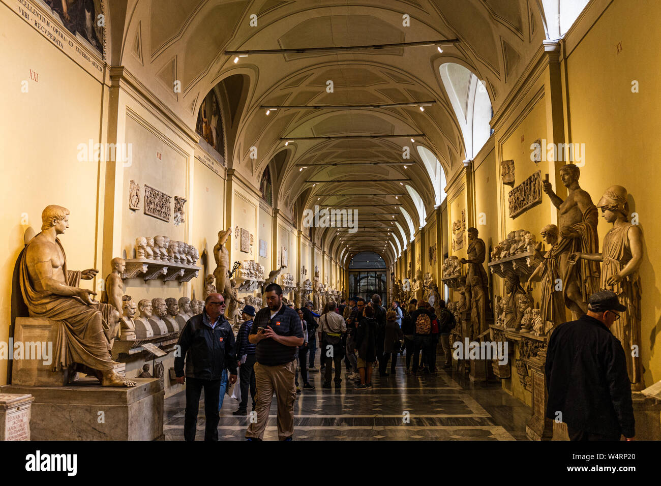 ROME, ITALY - JUNE 28, 2019: crowd of tourists walking in old museum ...