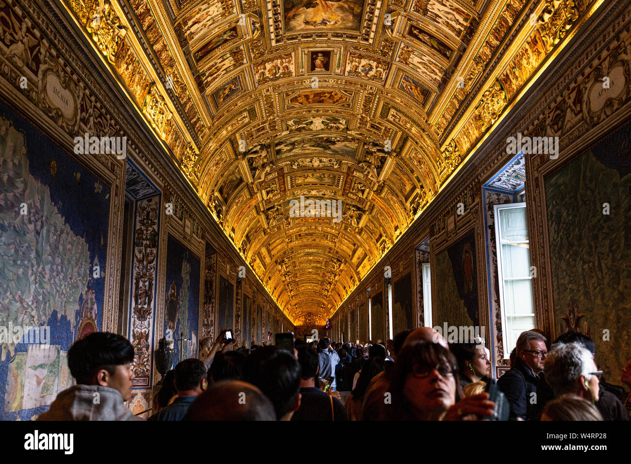 ROME, ITALY - JUNE 28, 2019: crowd of tourists walking and looking ...