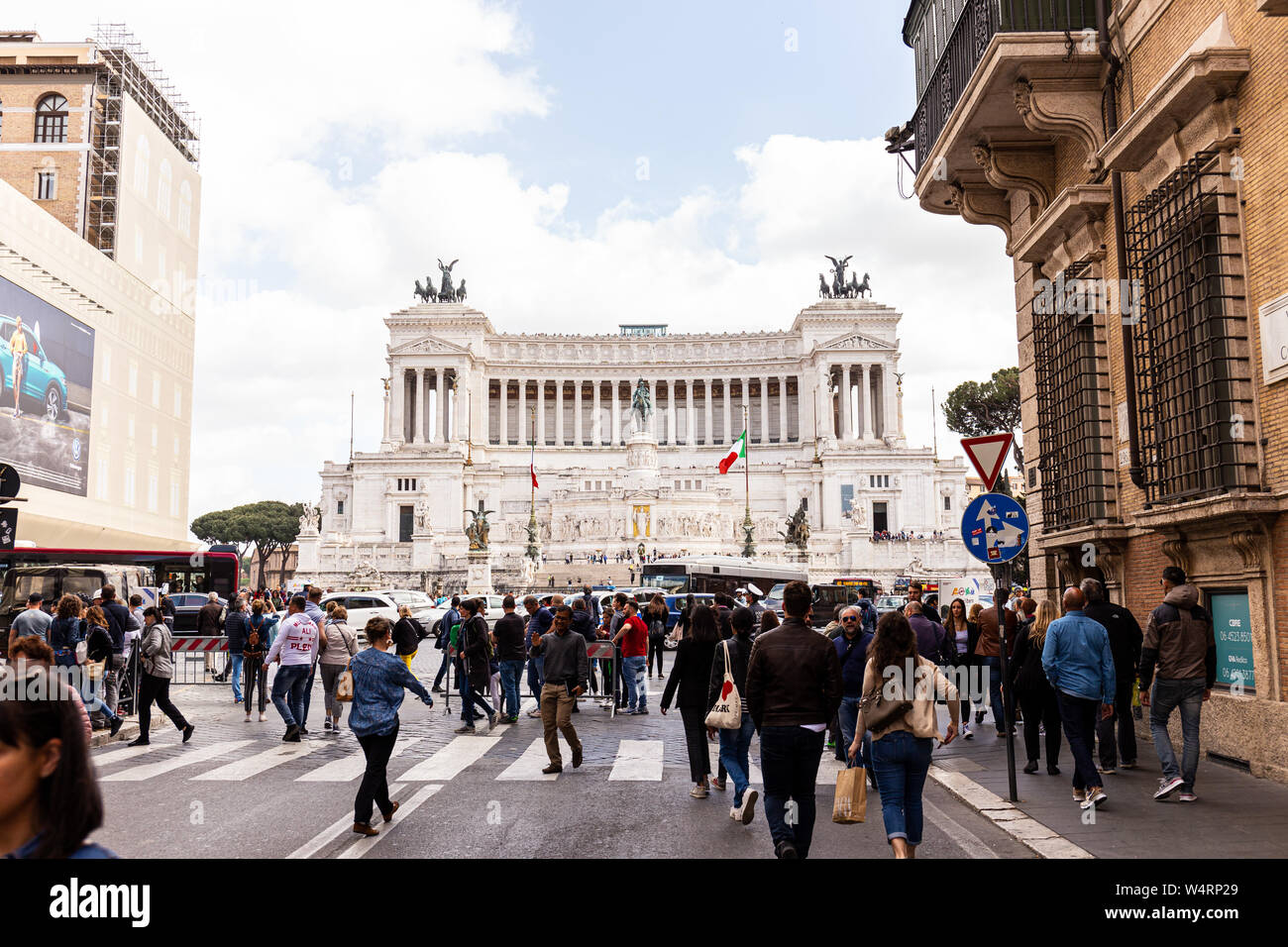 ROME, ITALY - JUNE 28, 2019: crowd of people walking on street near old ...