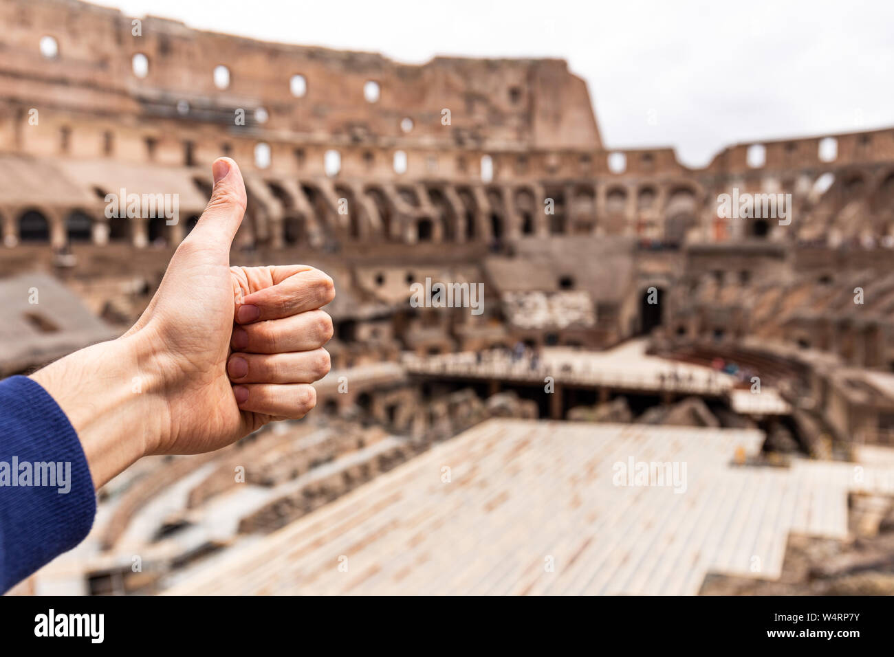 ROME, ITALY - JUNE 28, 2019: partial view of man showing thumb up in ...