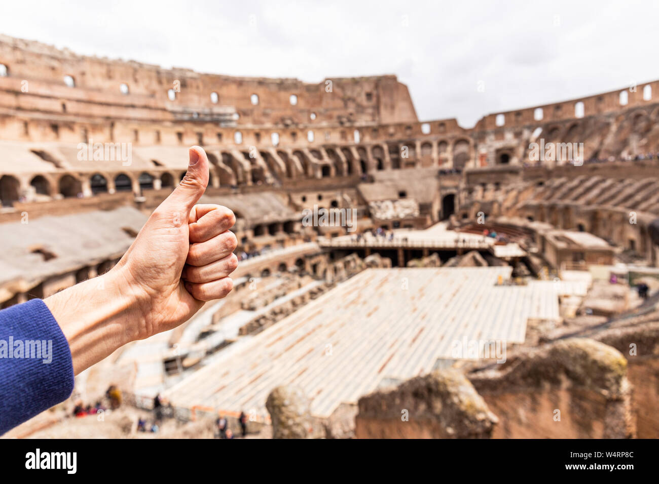 ROME, ITALY - JUNE 28, 2019: partial view of man showing thumb up in ...