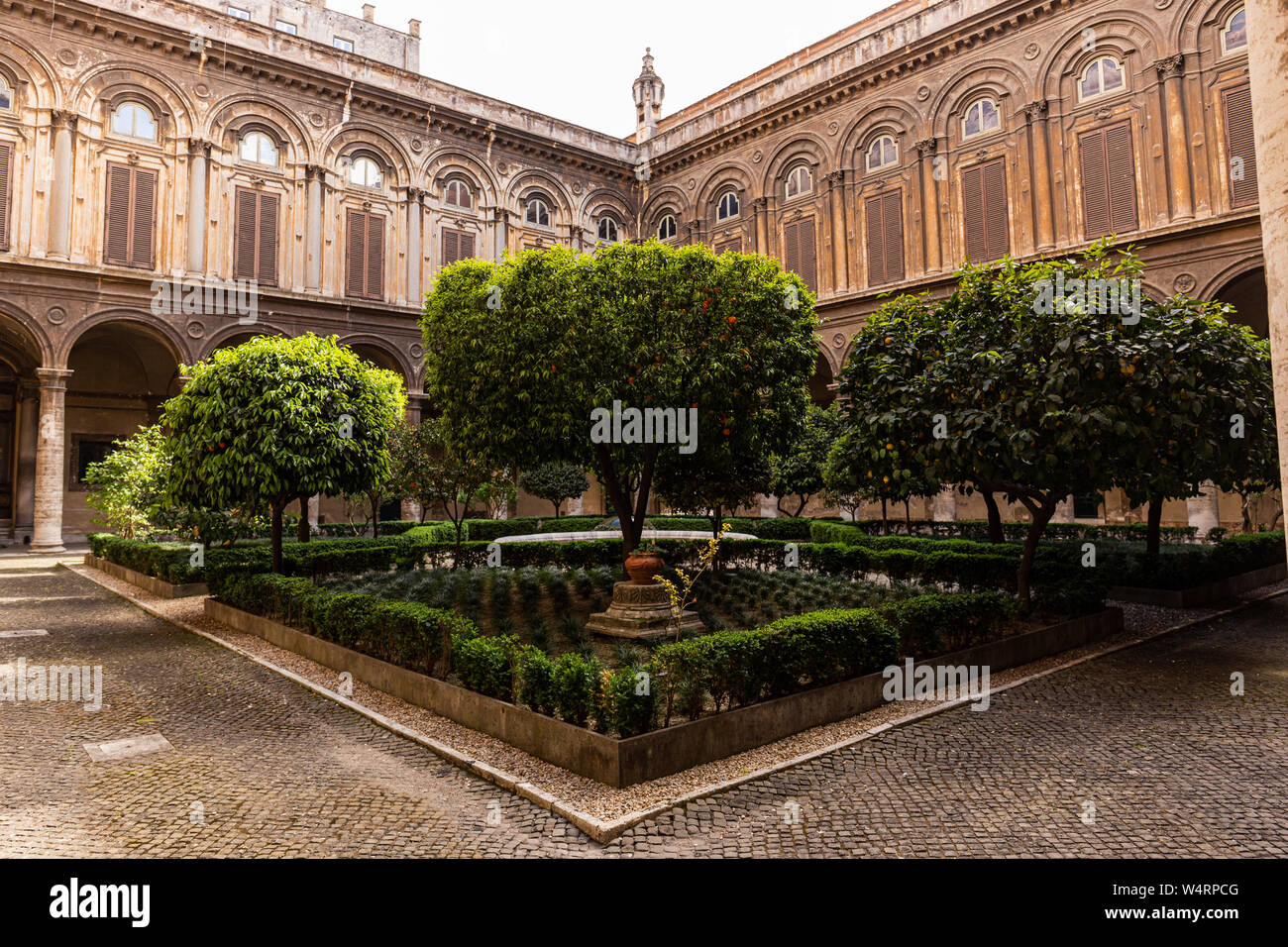 ROME, ITALY - JUNE 28, 2019: ancient buildings and green trees Stock ...