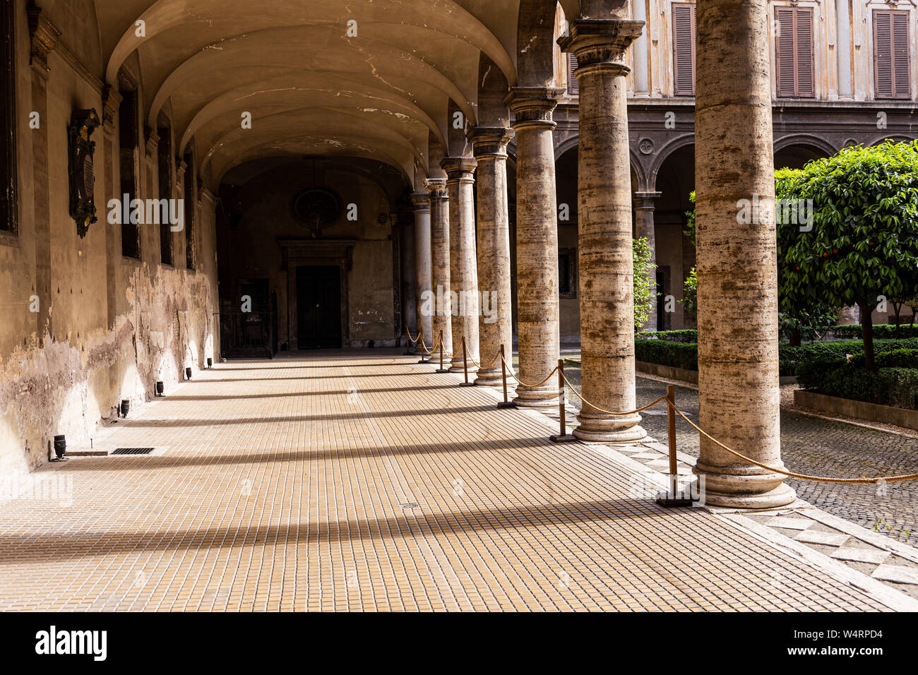 ROME, ITALY - JUNE 28, 2019: ancient building with columns and green ...