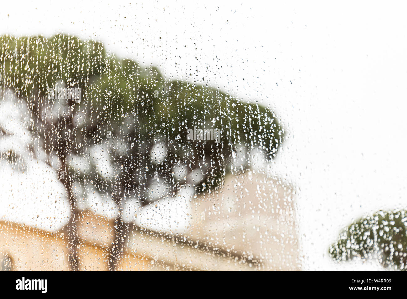 window glass with rain drops in rome, italy Stock Photo - Alamy