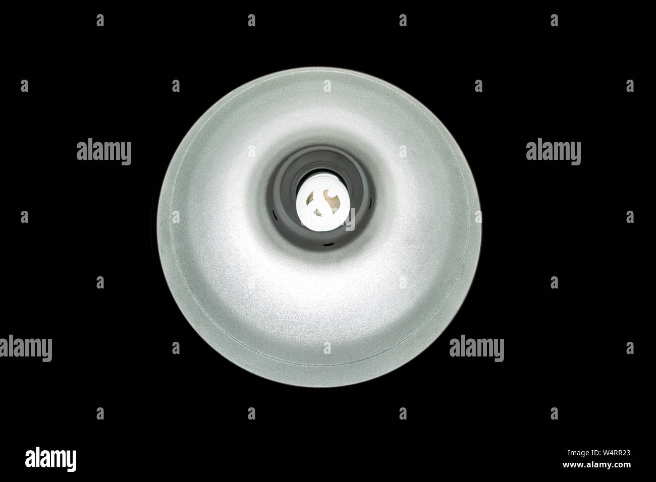 Light from a light bulb dangling above Stock Photo - Alamy