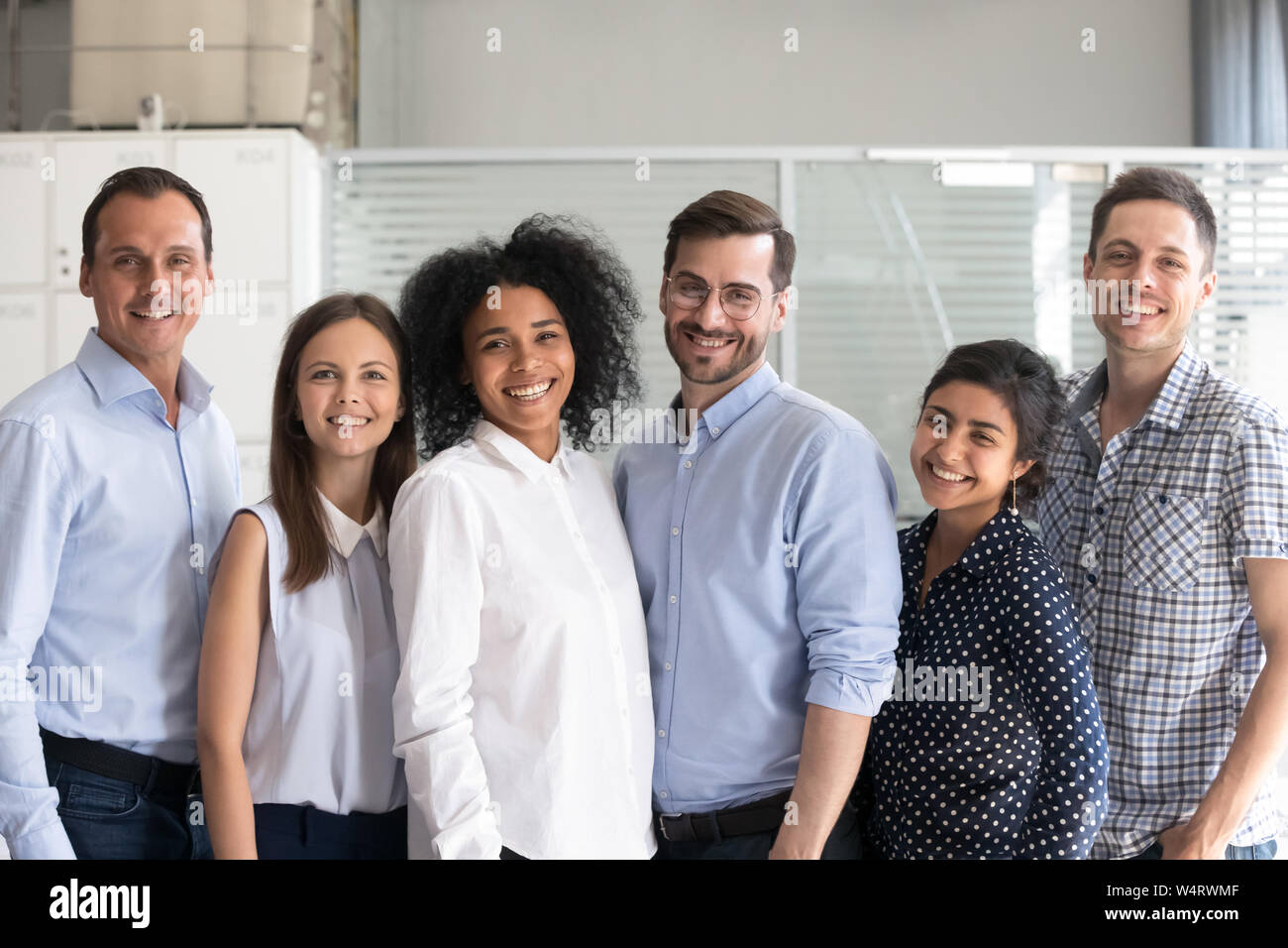 Smiling diverse office workers group, multiracial employees Stock Photo - Alamy