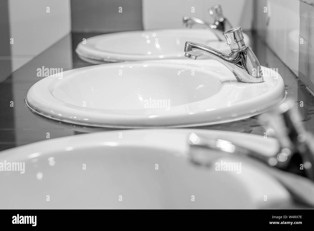 White basin in the bathroom in the house Stock Photo - Alamy