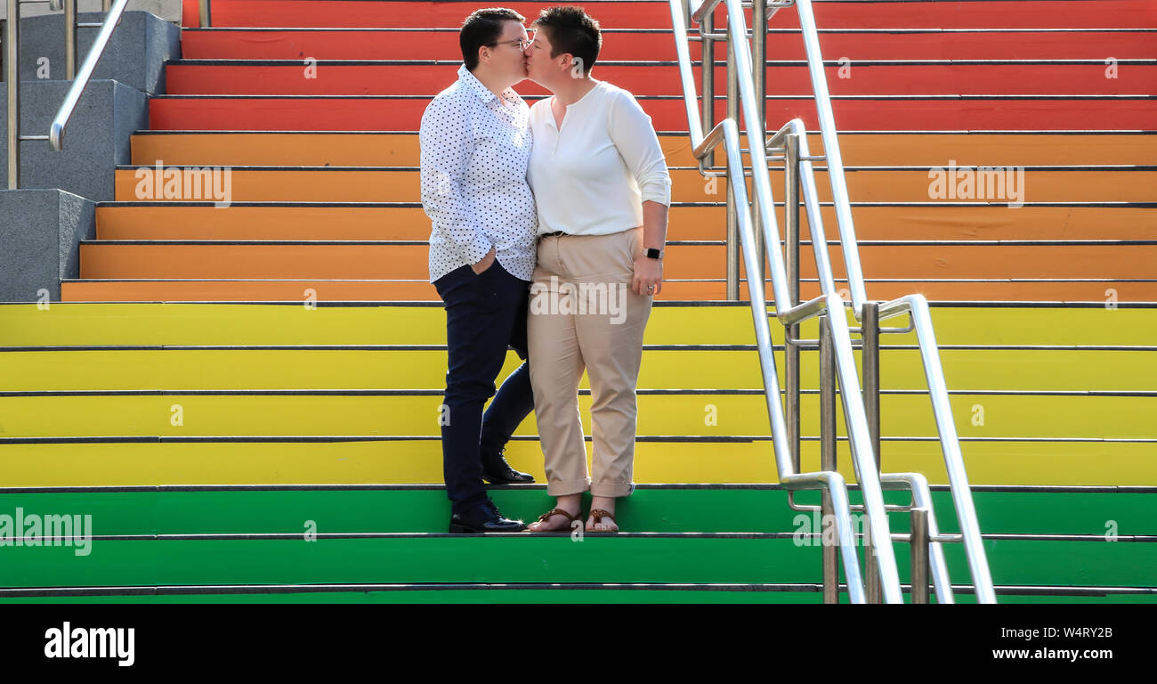 Donna and wife Lou Hall kiss on the rainbow painted Clayton Square ...