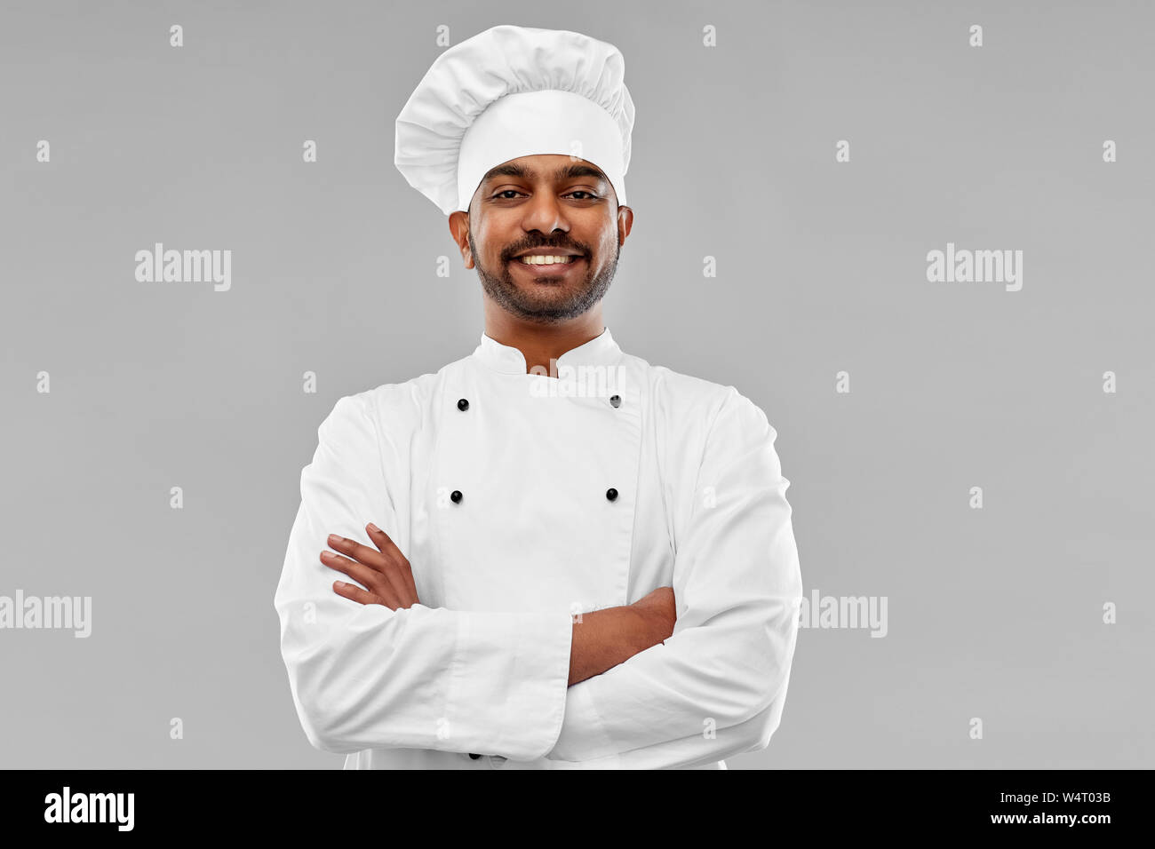 happy male indian chef in toque Stock Photo - Alamy