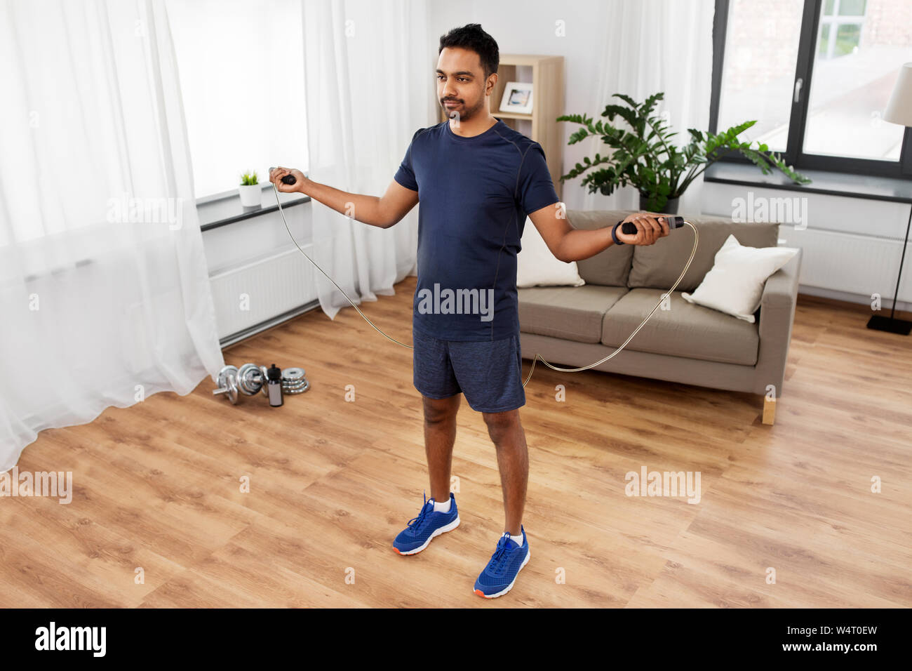 Indian man jumping hi-res stock photography and images - Alamy
