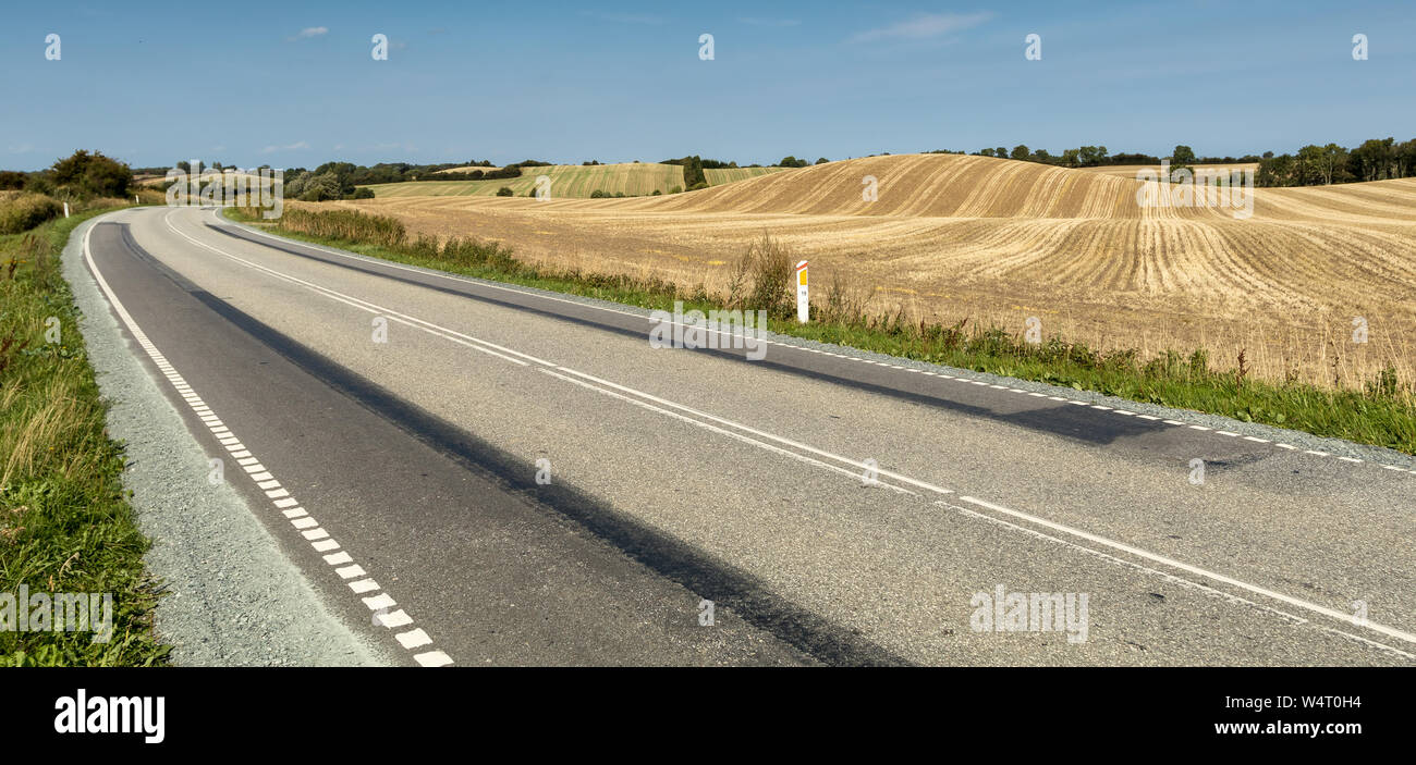 Road through rural landscape, Nordborg, Jutland, Denmark Stock Photo ...
