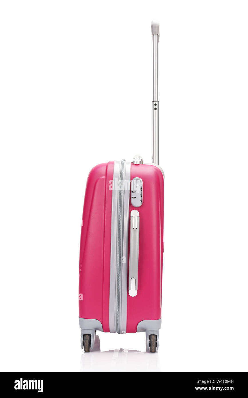 side view of red plastic wheeled suitcase with handle isolated on white ...