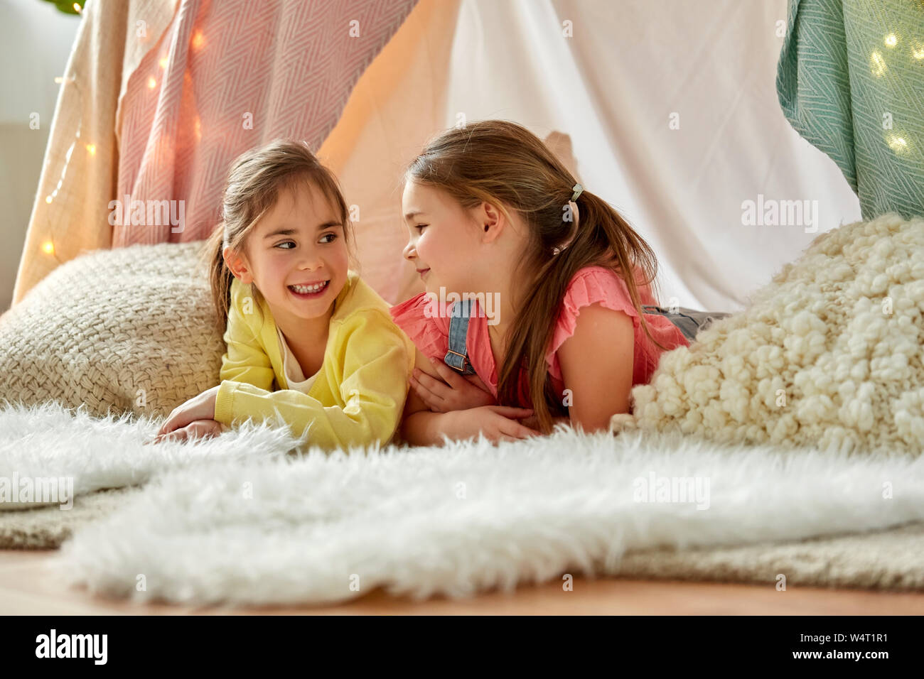 little girls talking in kids tent at home Stock Photo - Alamy