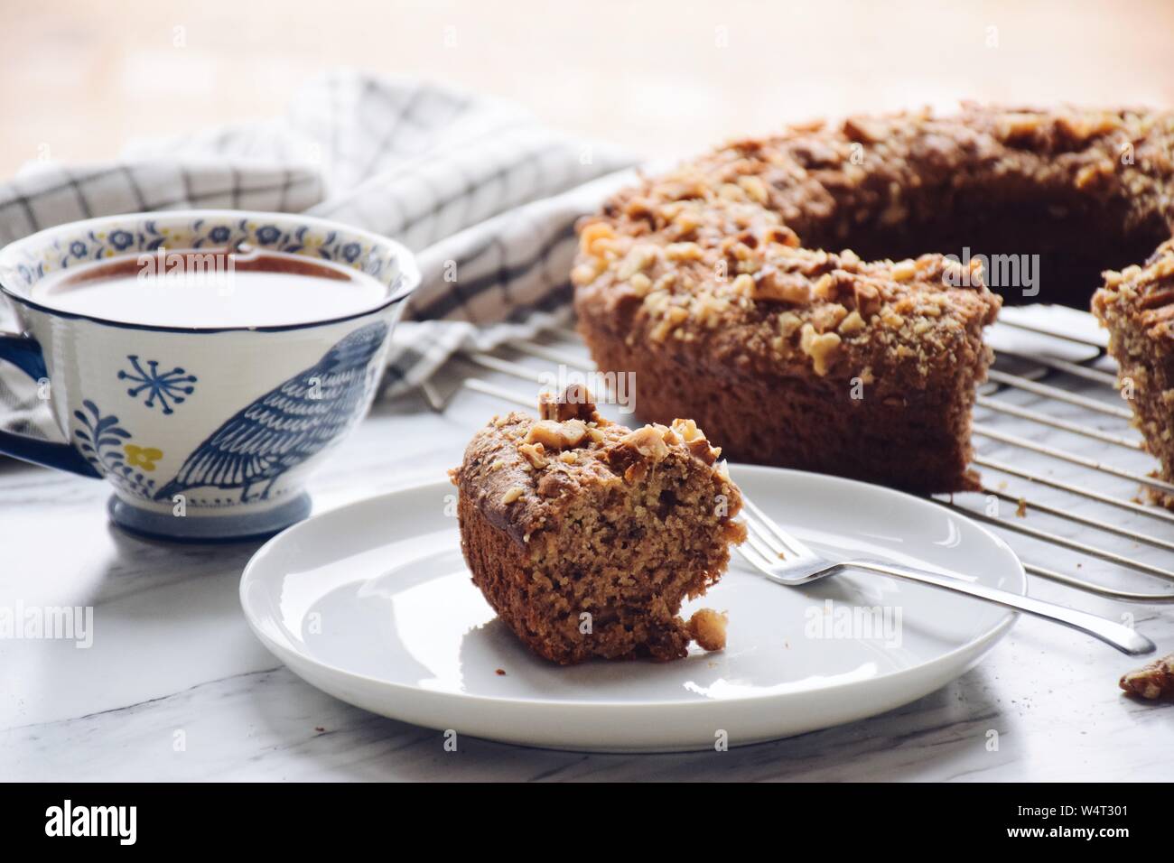 Banana and walnut cake with tea Stock Photo - Alamy