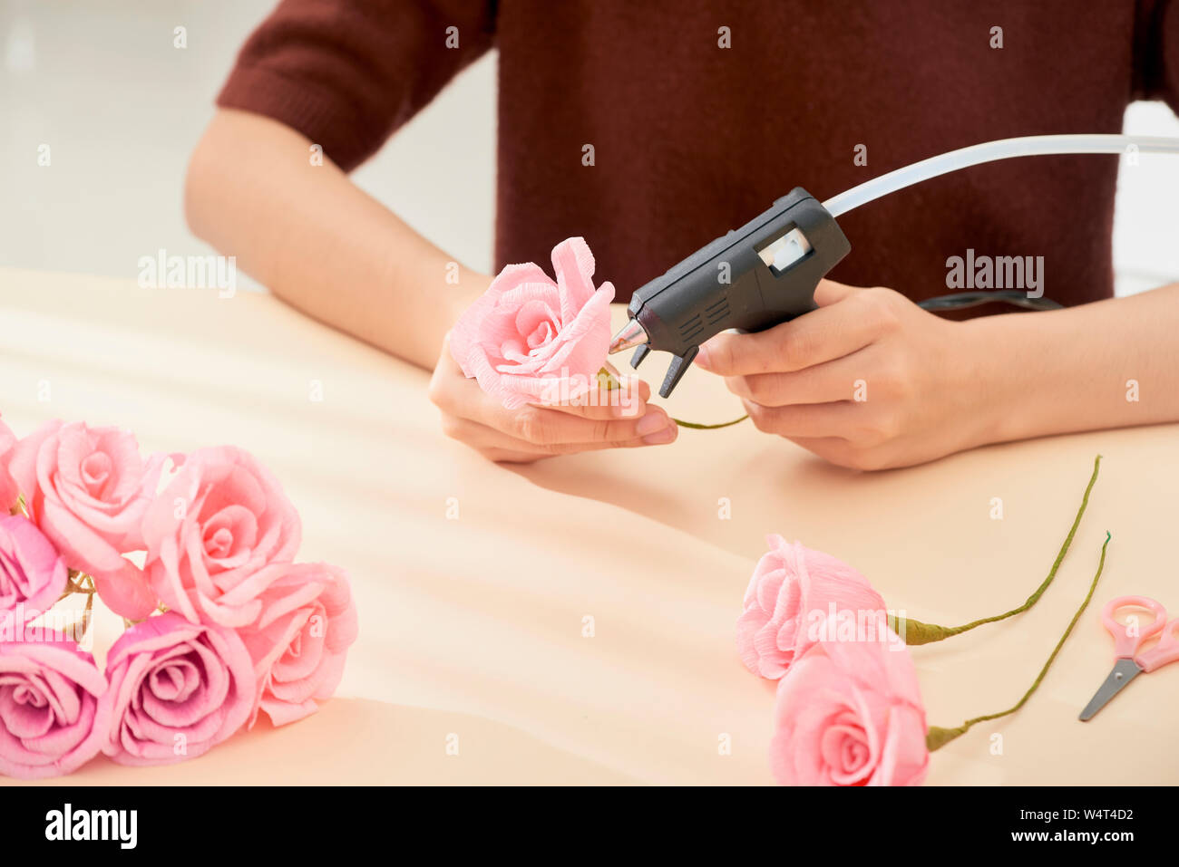 People making paper craft flower art Stock Photo - Alamy