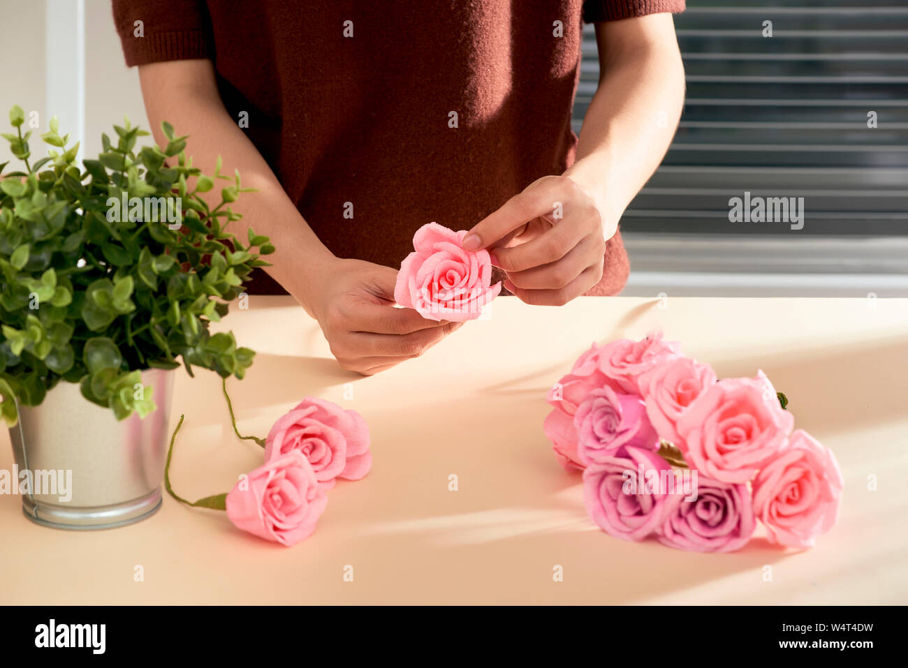 People making paper craft flower art Stock Photo - Alamy