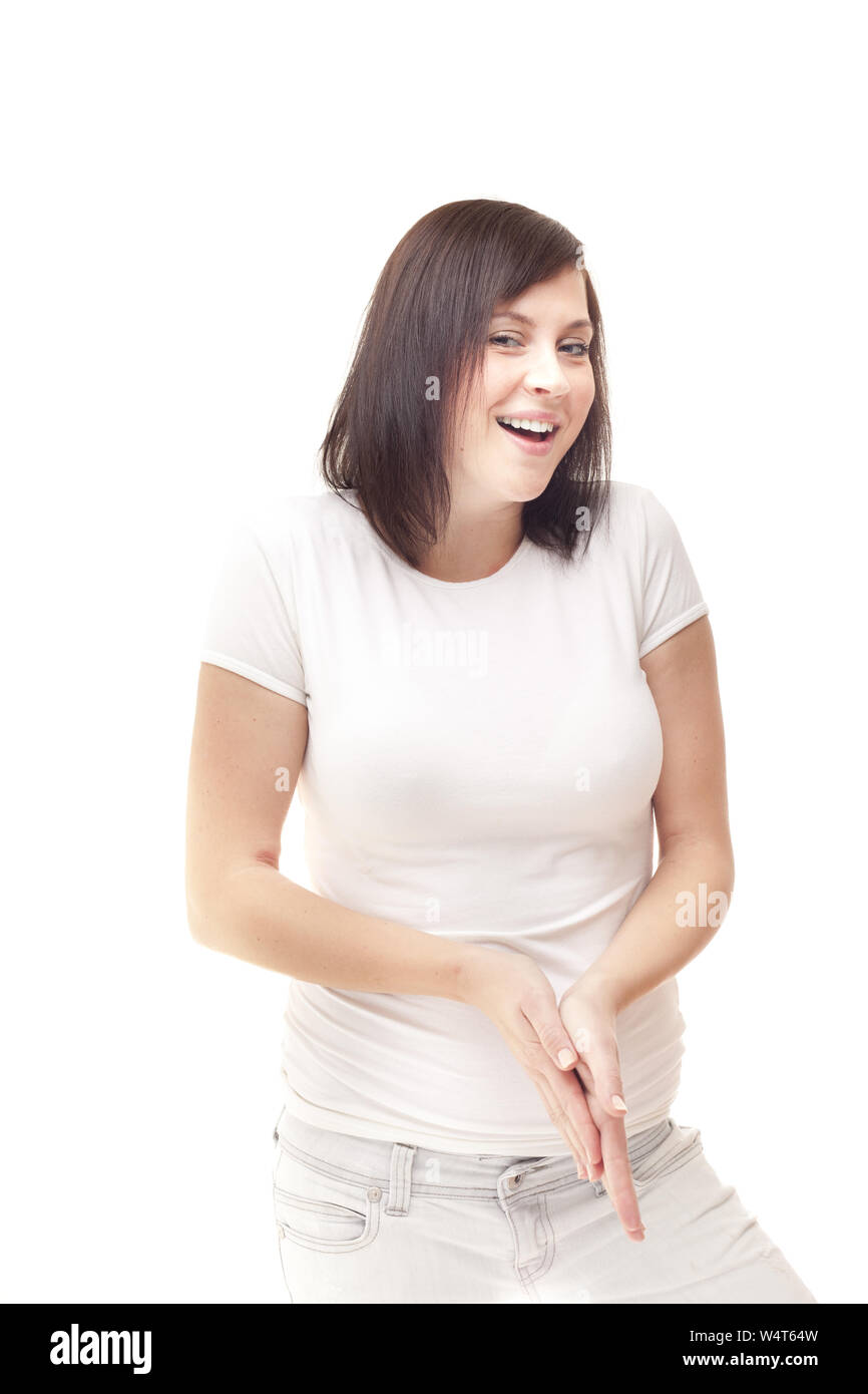Insidious, smiling woman clapping hands on white background Stock Photo ...