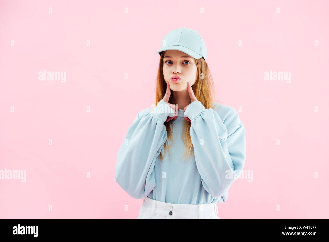 Teenager with pink cap hi-res stock photography and images - Alamy