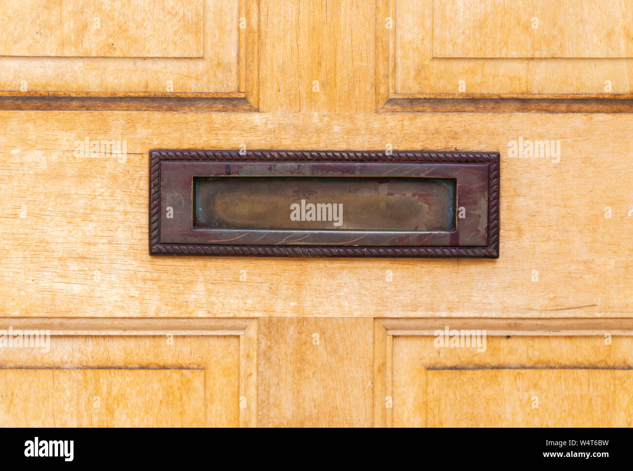 Old letterbox in the door, traditional way of delivering letters to the ...