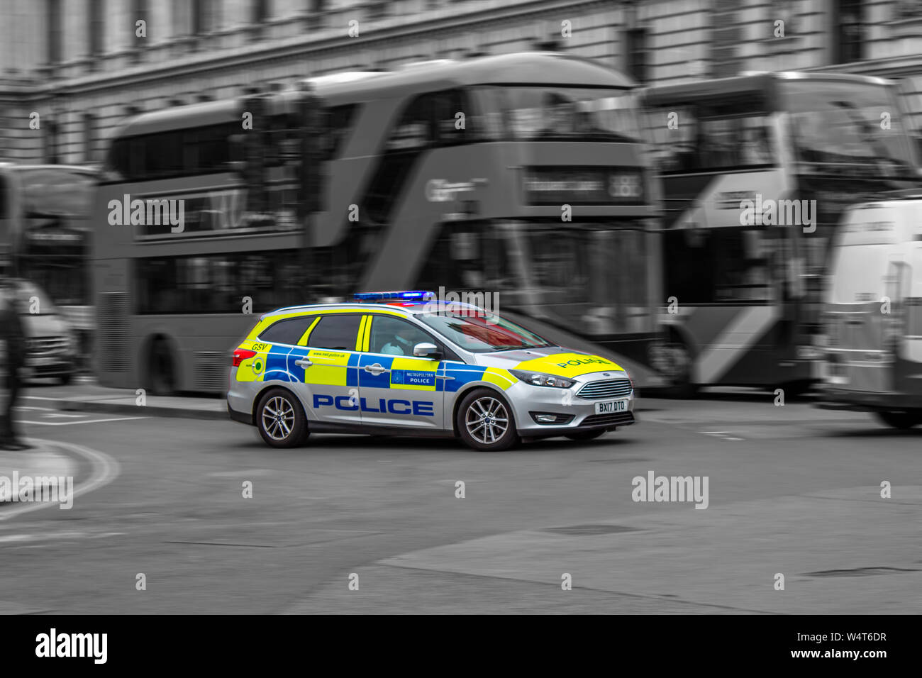 Police car on the way to the police operation Stock Photo - Alamy