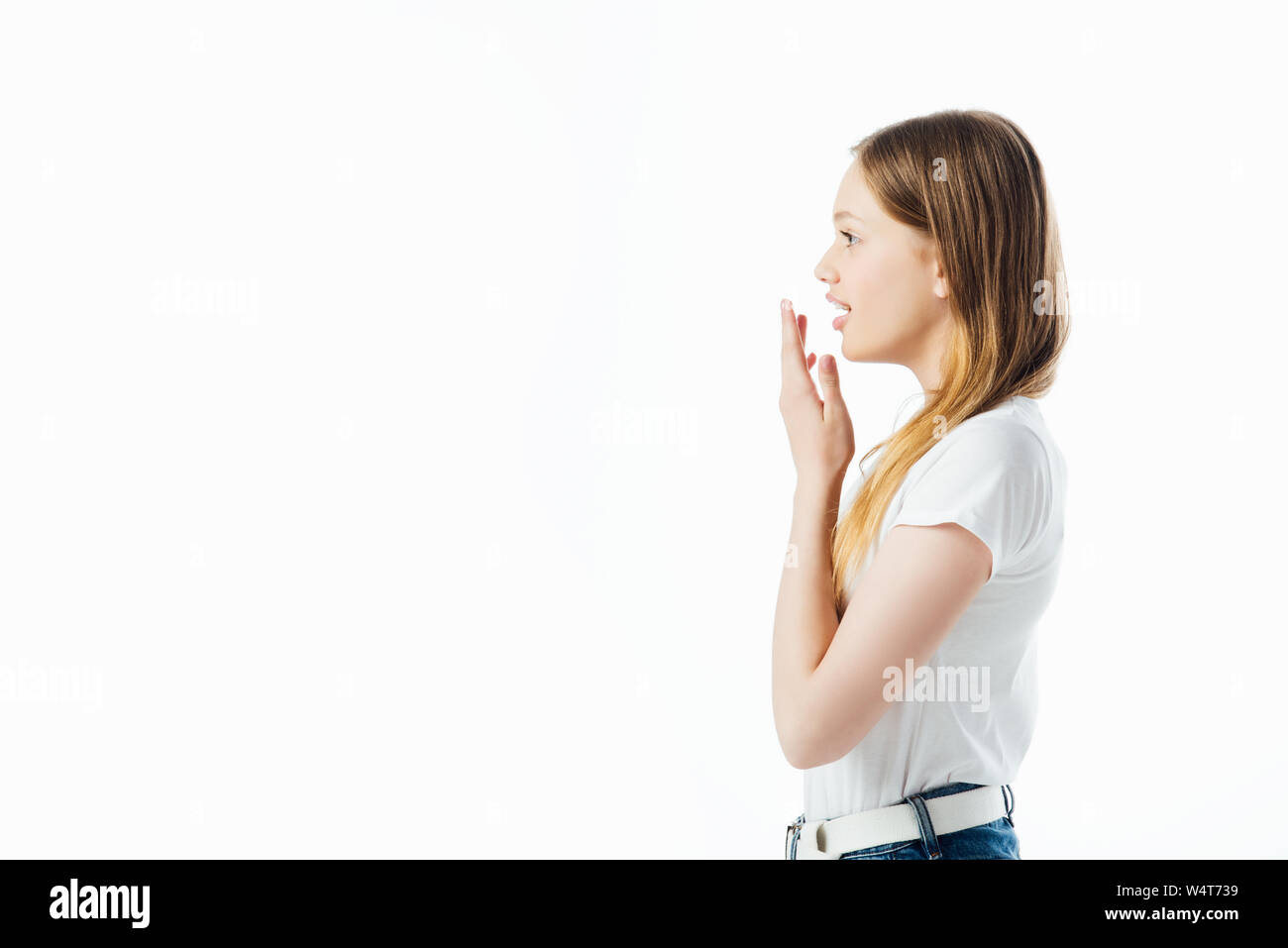 side view of surprised teenage girl isolated on white Stock Photo - Alamy