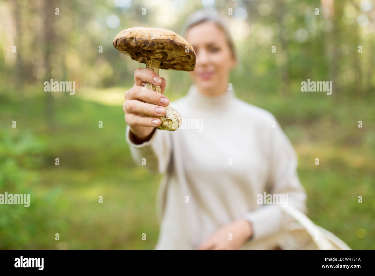 Woman with mushroom hi-res stock photography and images - Alamy