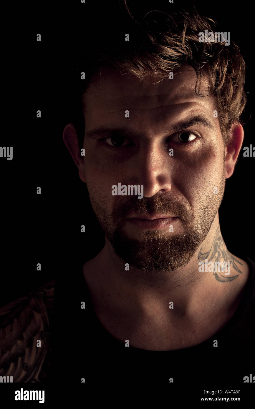 low key portrait of gangster in the darkness Stock Photo - Alamy