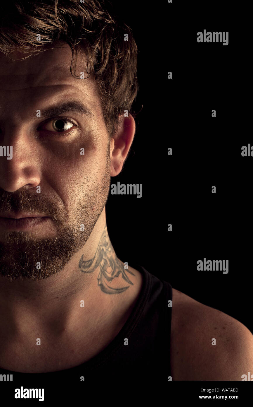 low key portrait of gangster in the darkness Stock Photo - Alamy