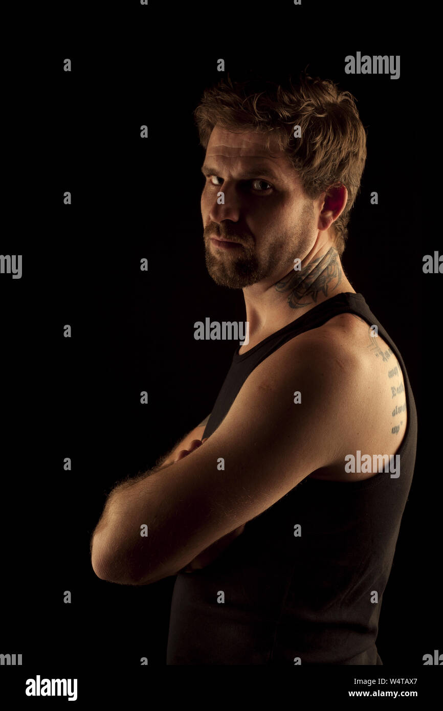 low key portrait of gangster in the darkness Stock Photo - Alamy