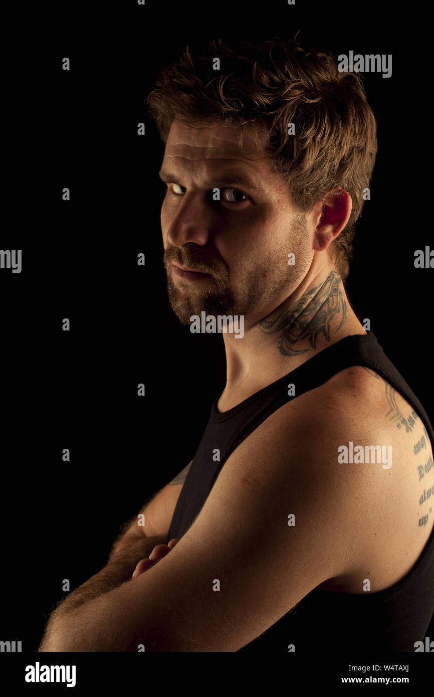 low key portrait of gangster in the darkness Stock Photo - Alamy