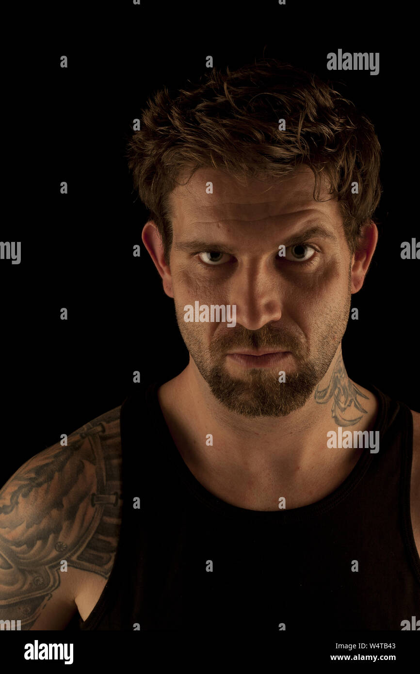 low key portrait of gangster in the darkness Stock Photo - Alamy