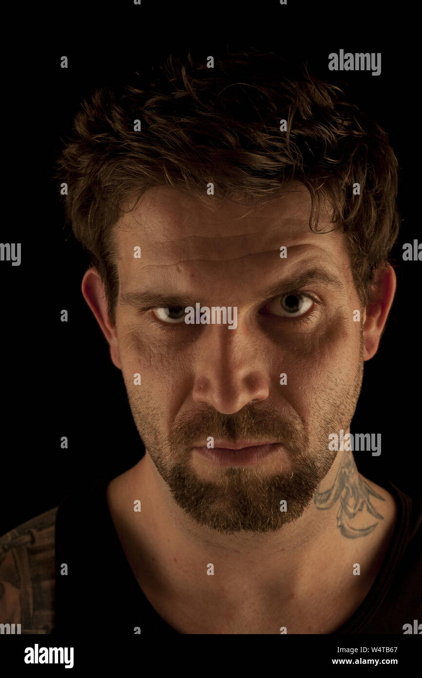 low key portrait of gangster in the darkness Stock Photo - Alamy