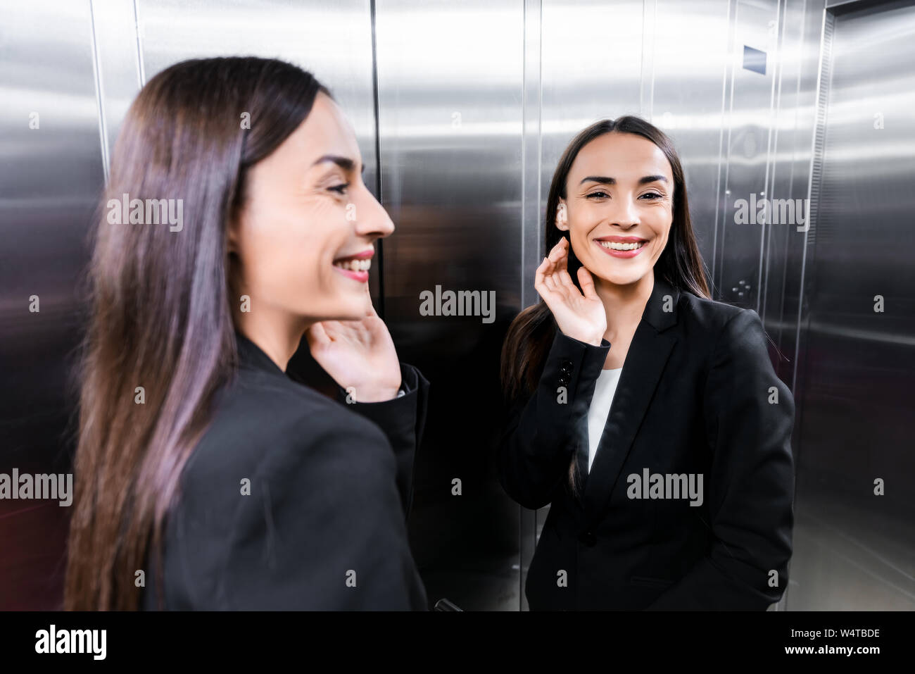 Attractive elevator hi-res stock photography and images - Alamy
