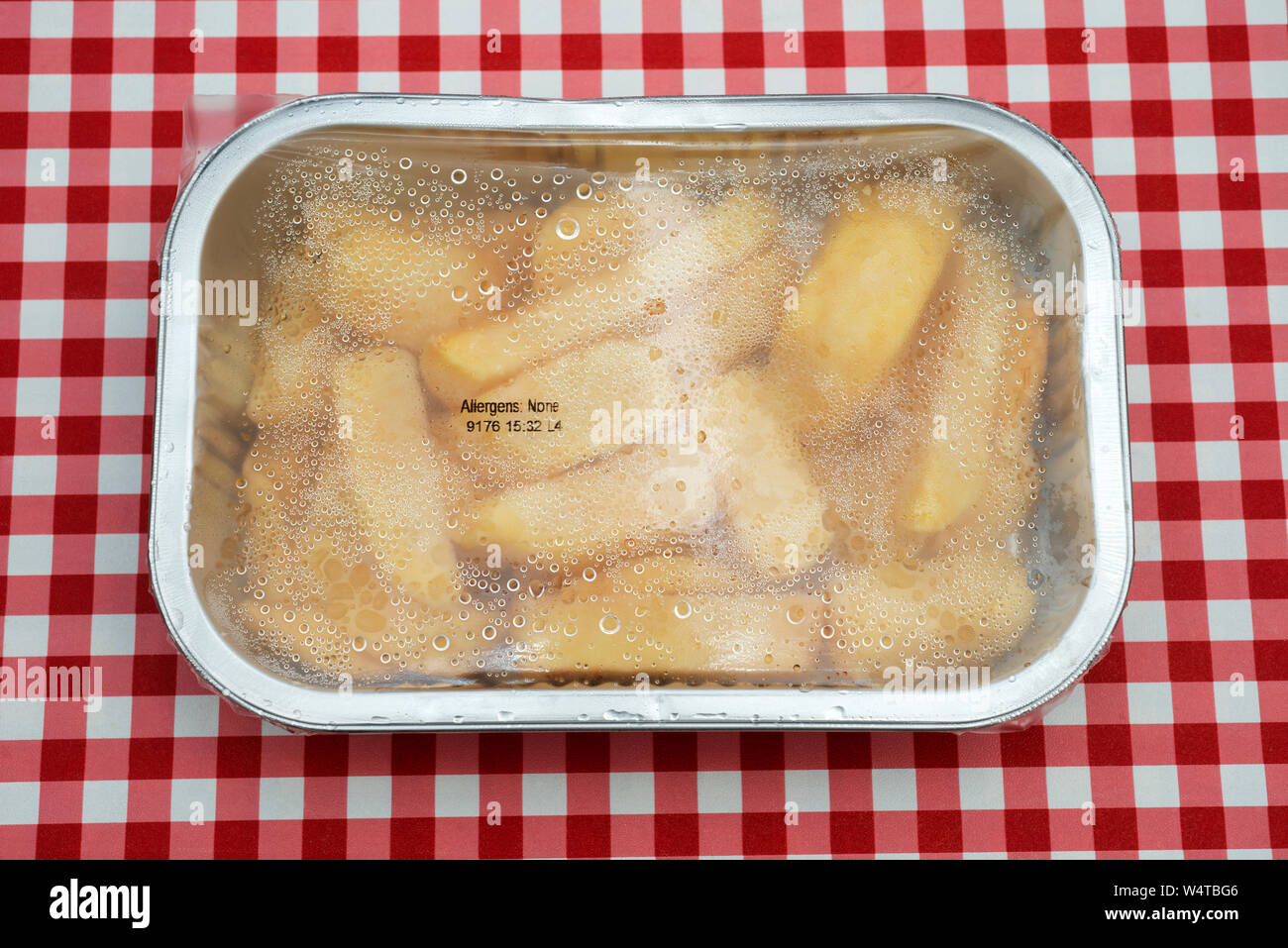 Pre prepared oven chips Stock Photo - Alamy