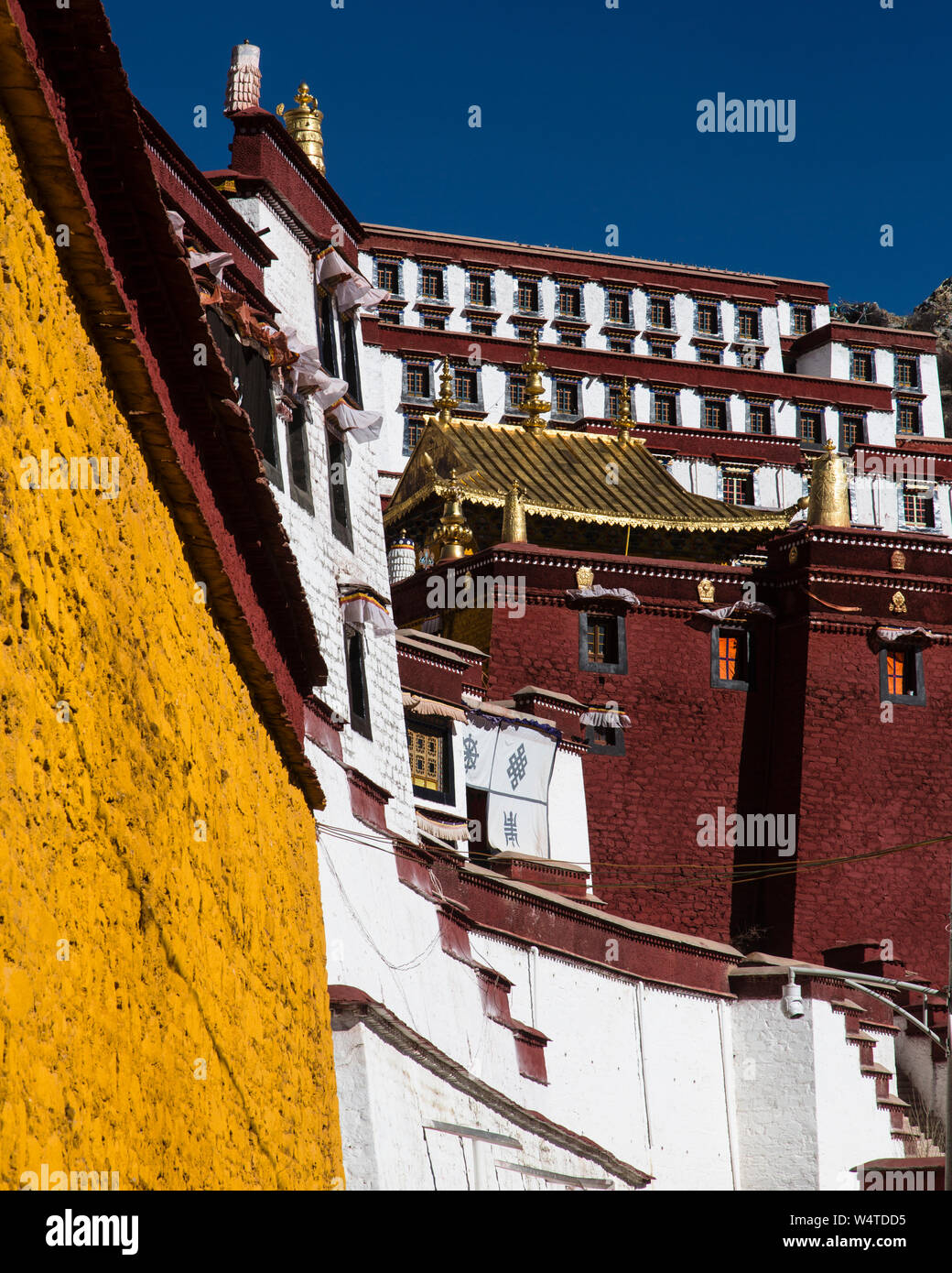 China, Tibet, Lhasa, The Ganden Monastery sits at the top of a natural ...