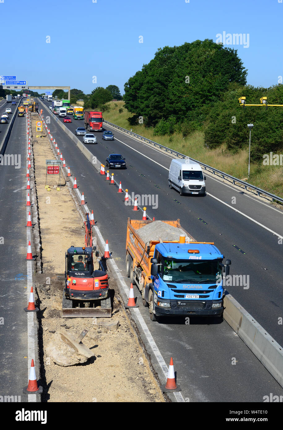 lorry carrying aggregate for upgrade roadworks on the M62 motorway ...