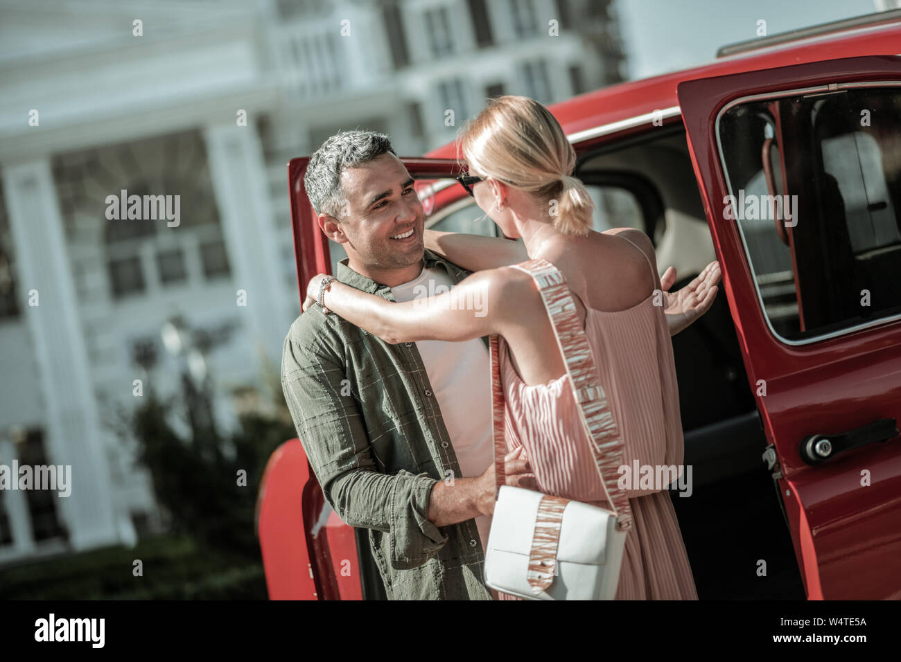 People Hugging Goodbye