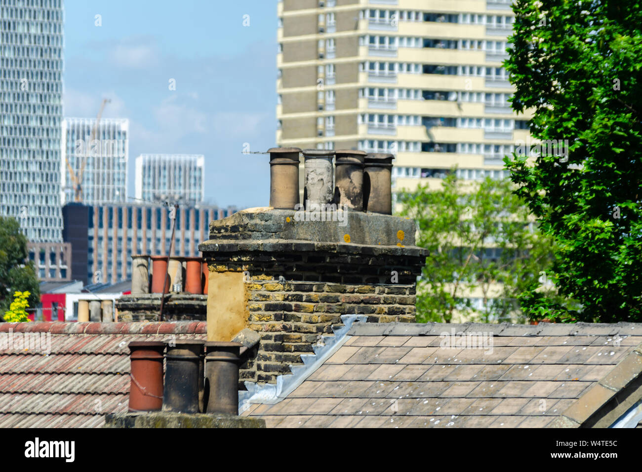 Typical English chimneys on the roofs of London buildings, an element ...