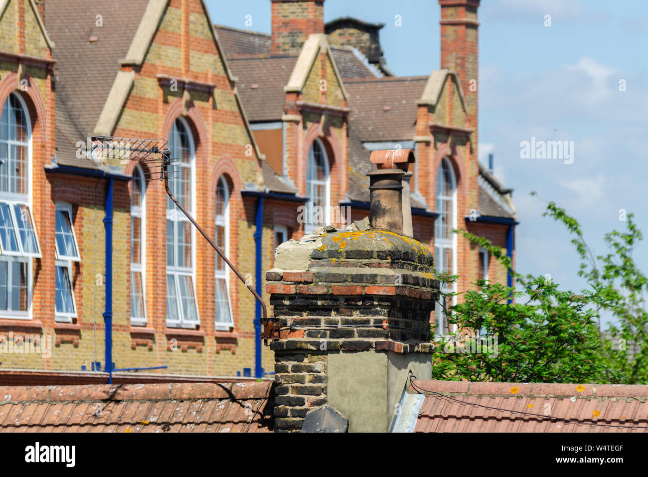 Typical English chimneys on the roofs of London buildings, an element ...