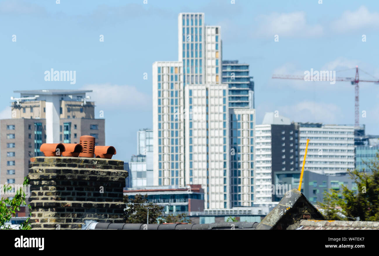 Typical English chimneys on the roofs of London buildings, an element ...