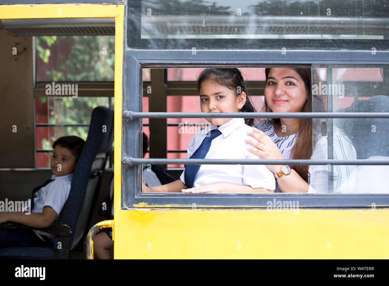 School girls school bus hi-res stock photography and images - Alamy