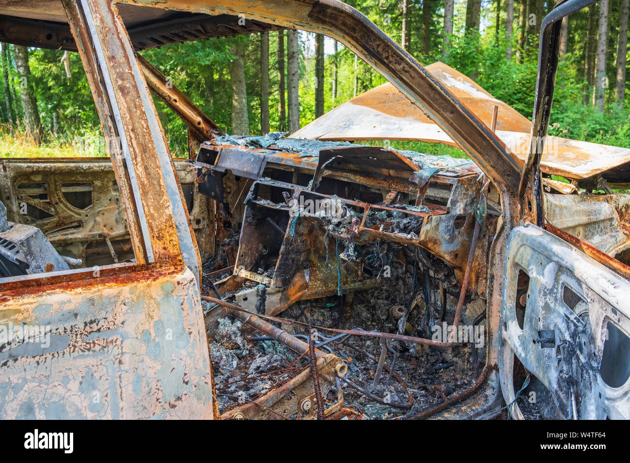 Interior of a burned-out car from the driver's side Stock Photo - Alamy