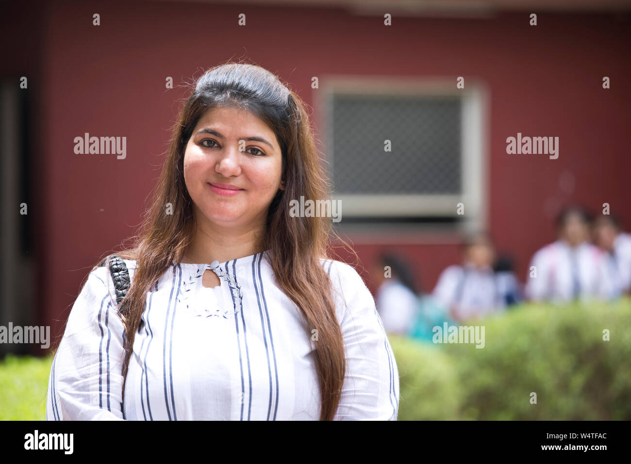 Portrait of beautiful Indian woman smiling looking at camera Stock ...